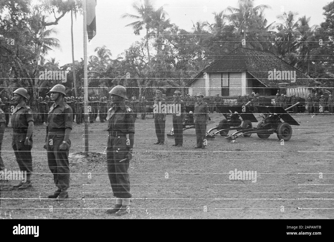 Swearing. Knil troops are in office. Three soldiers are standing by a ...