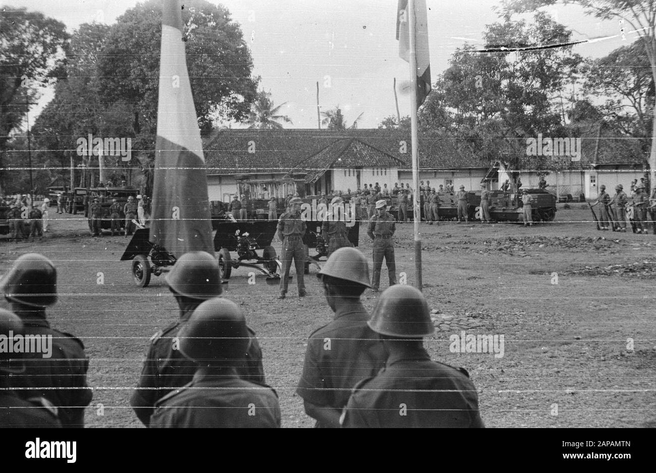 Swearing. Knil troops are in office. Three soldiers are standing by a ...