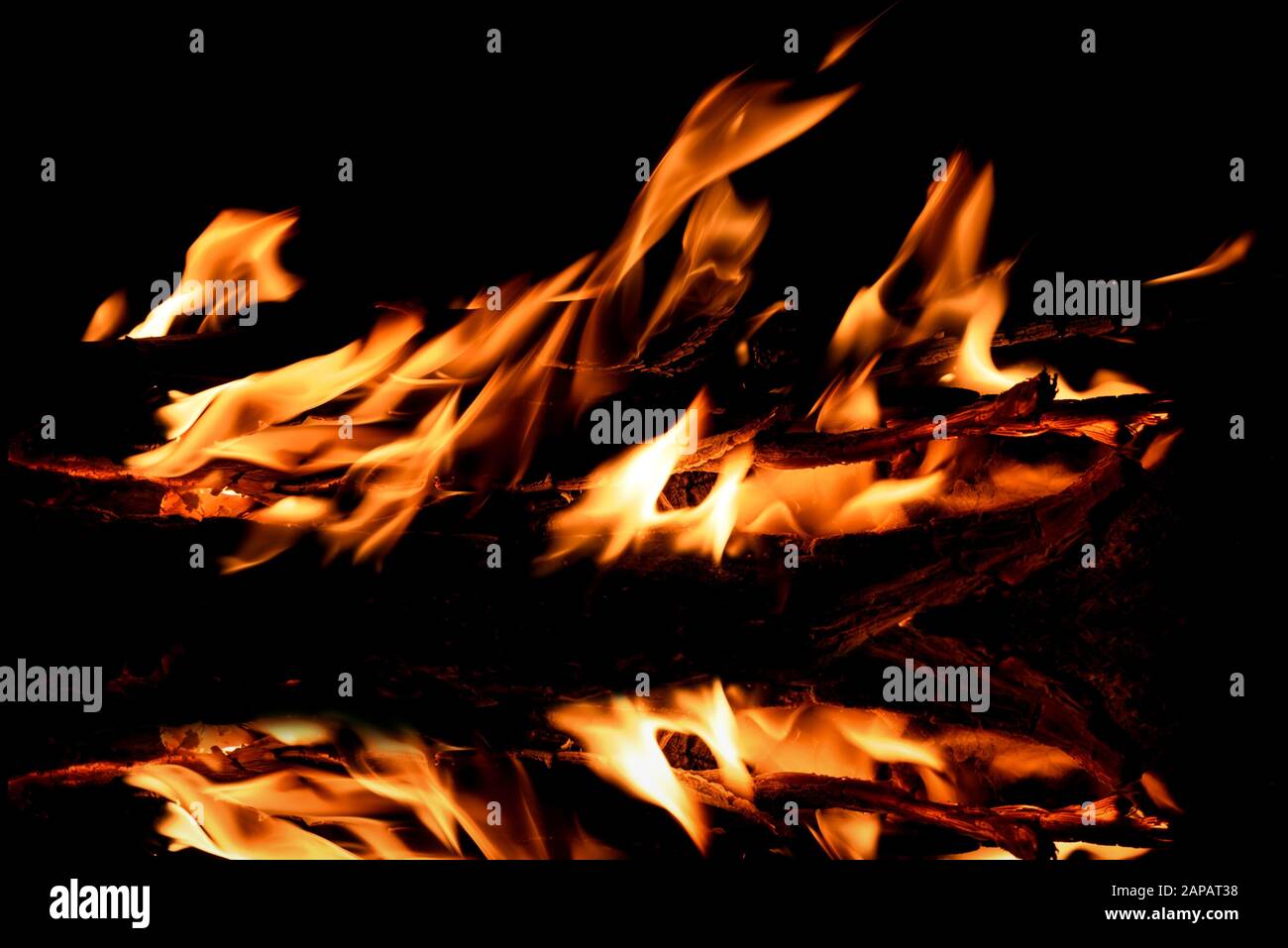 Beautiful bright flame from a fire on a black background with ...