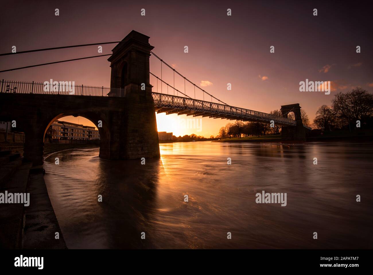 Sunset at Wilford Suspension Bridge on the River Trent at Victoria ...