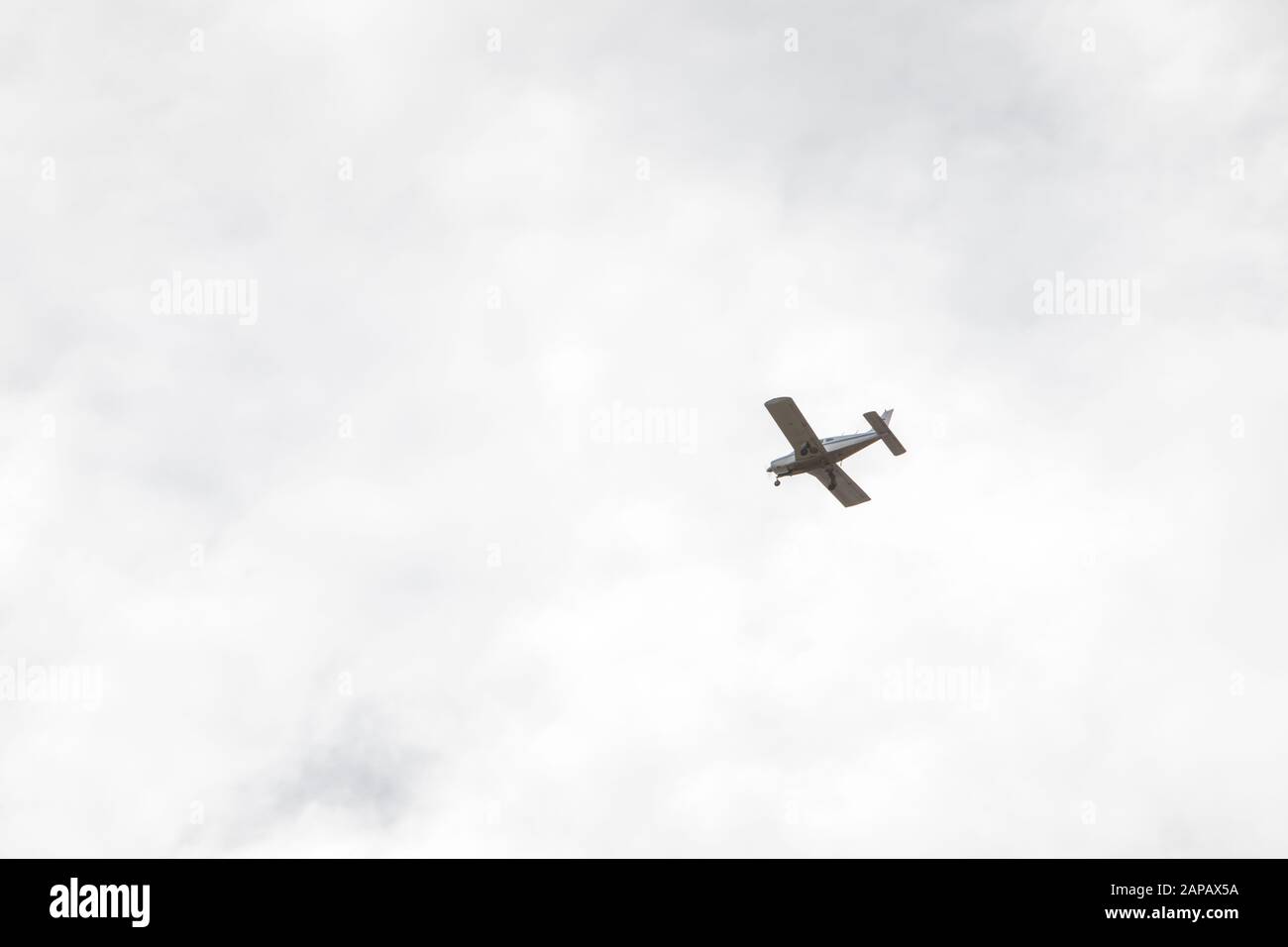 small airplane in sky Stock Photo - Alamy