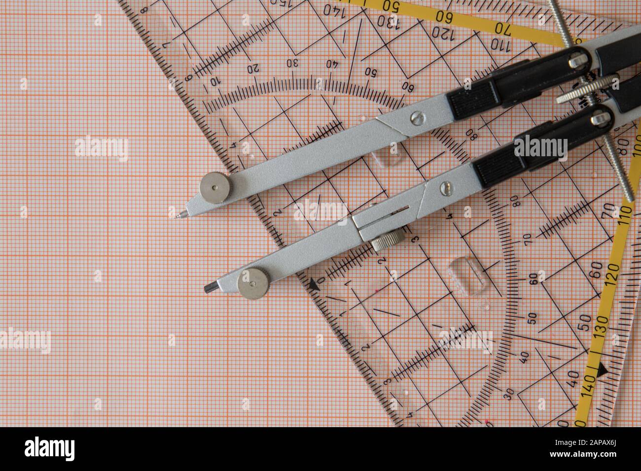 drawing instruments for maths with millimeter paper Stock Photo - Alamy
