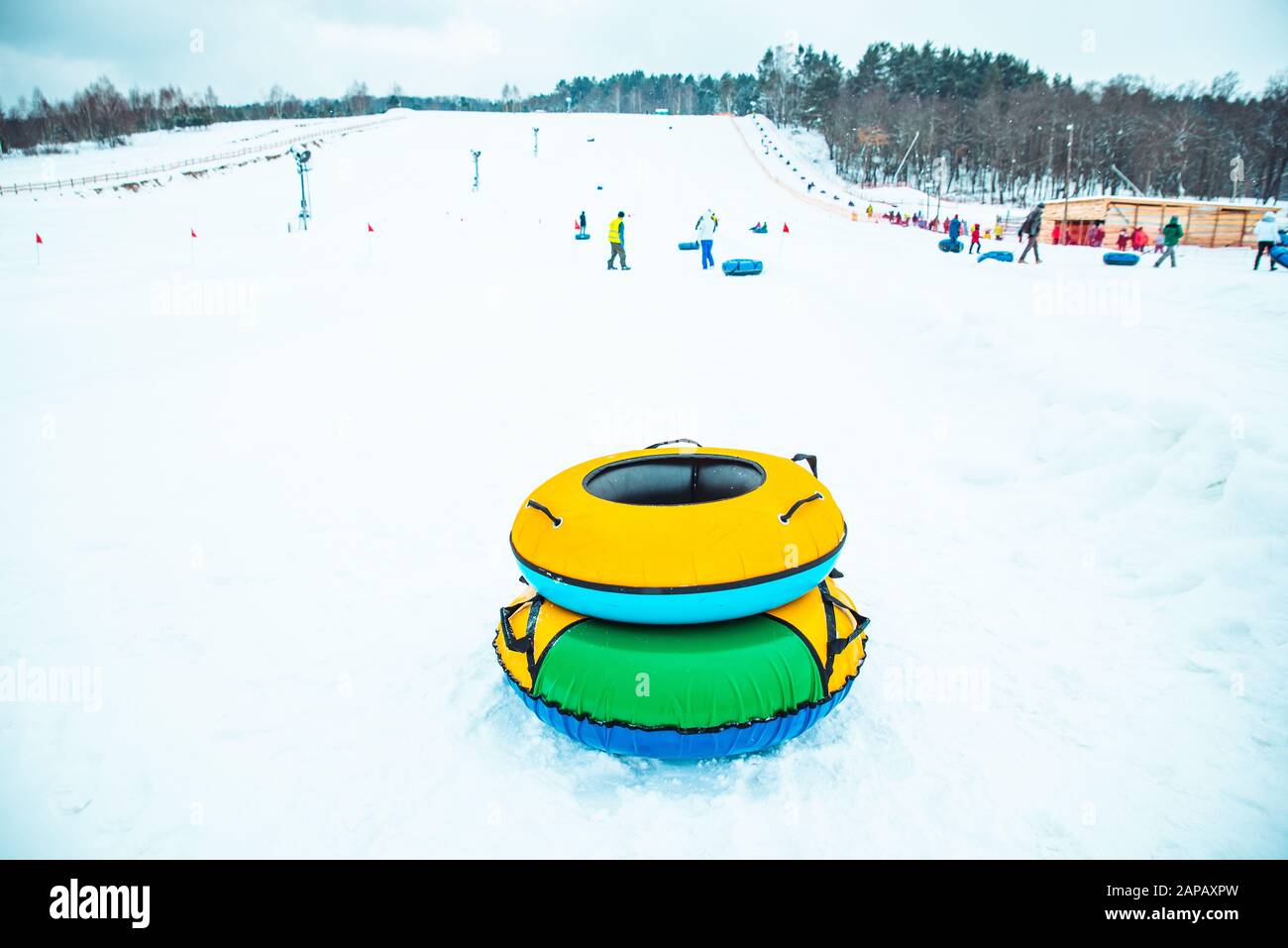 Women snow tubing hi-res stock photography and images - Alamy