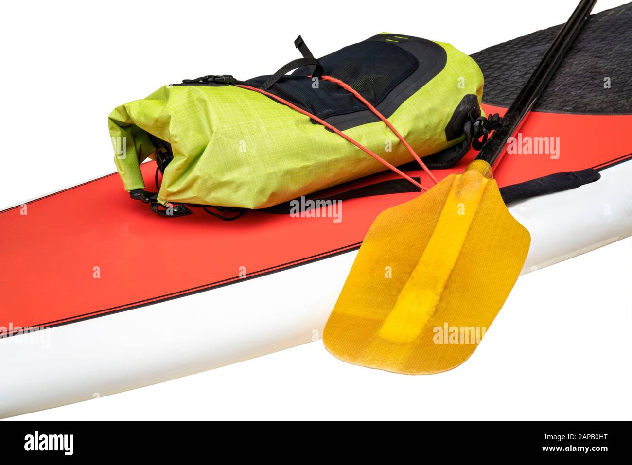 isolated deck of an expedition stand up paddleboard with a paddle and ...