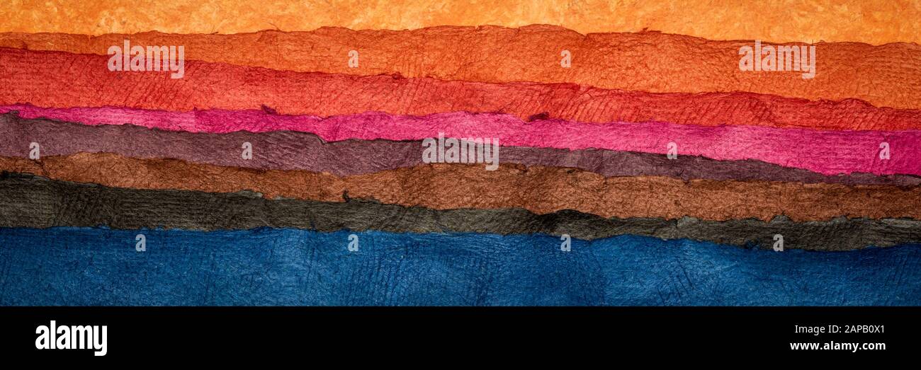 abstract sunset landscape created with sheets of textured colorful ...