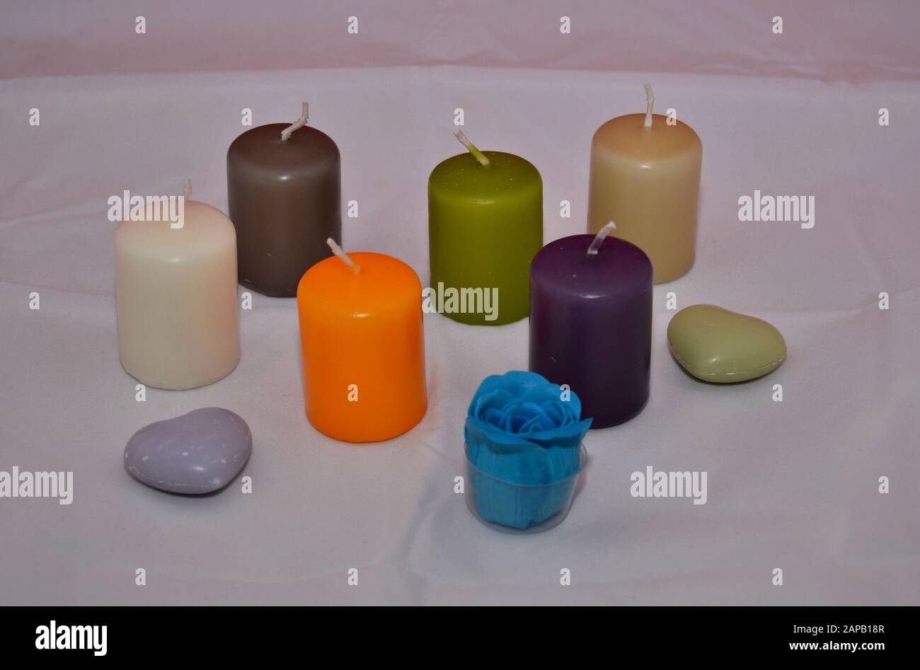 Small candles for decoration of various colors and shapes, of flowers ...
