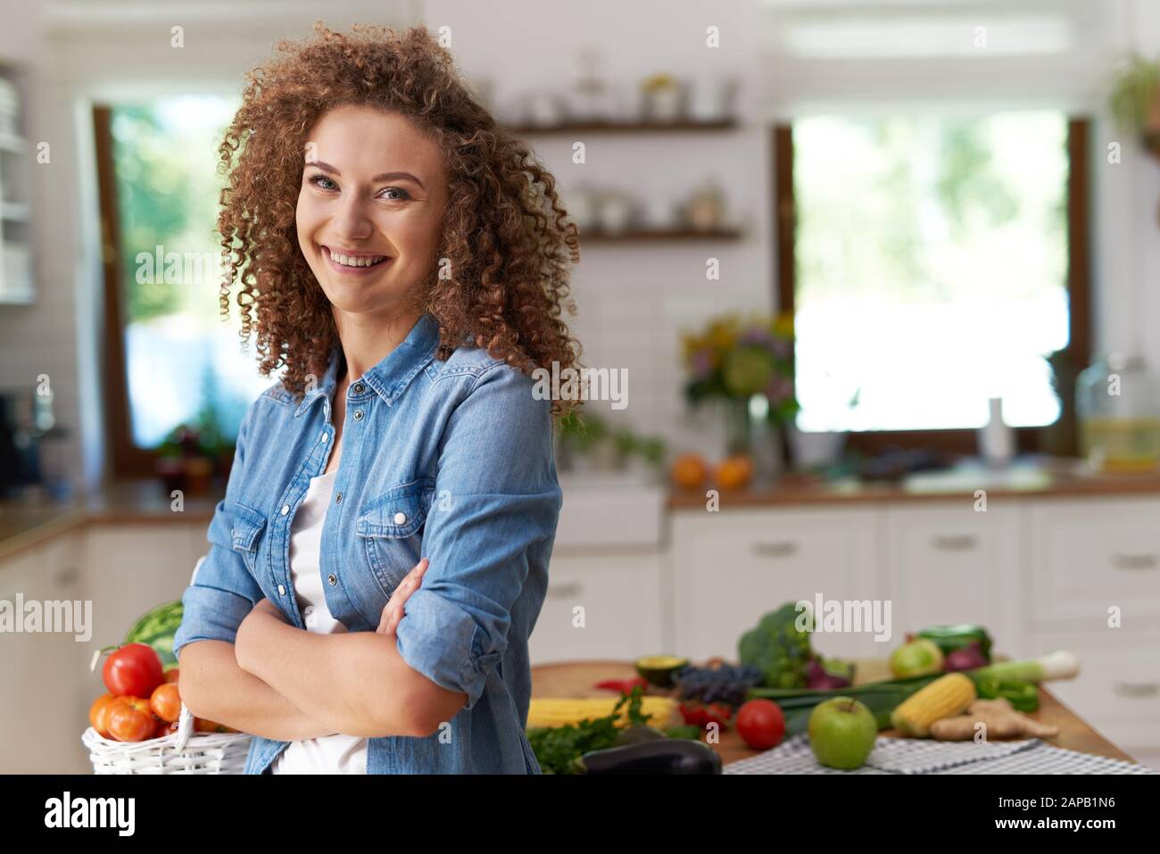 Woman in her kitchen hi-res stock photography and images - Alamy
