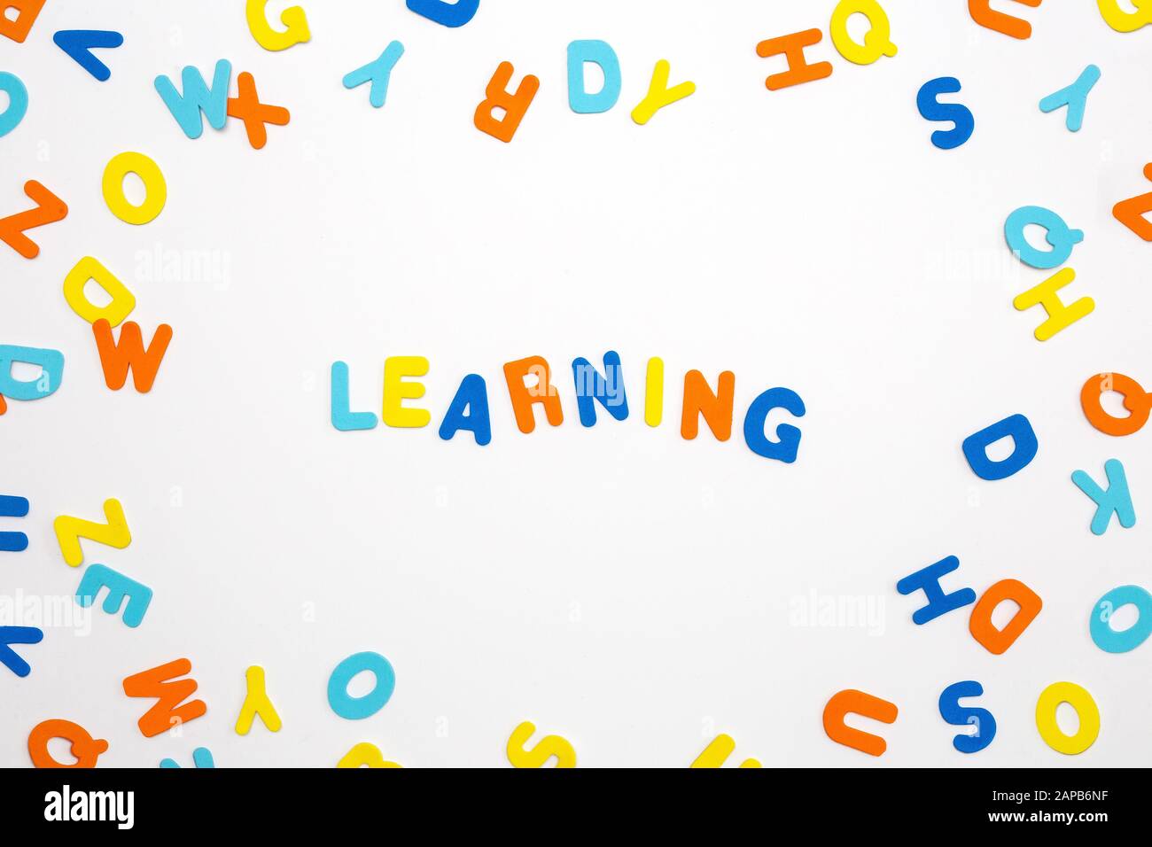 Colorful letters and the word learning on white background, learning or ...