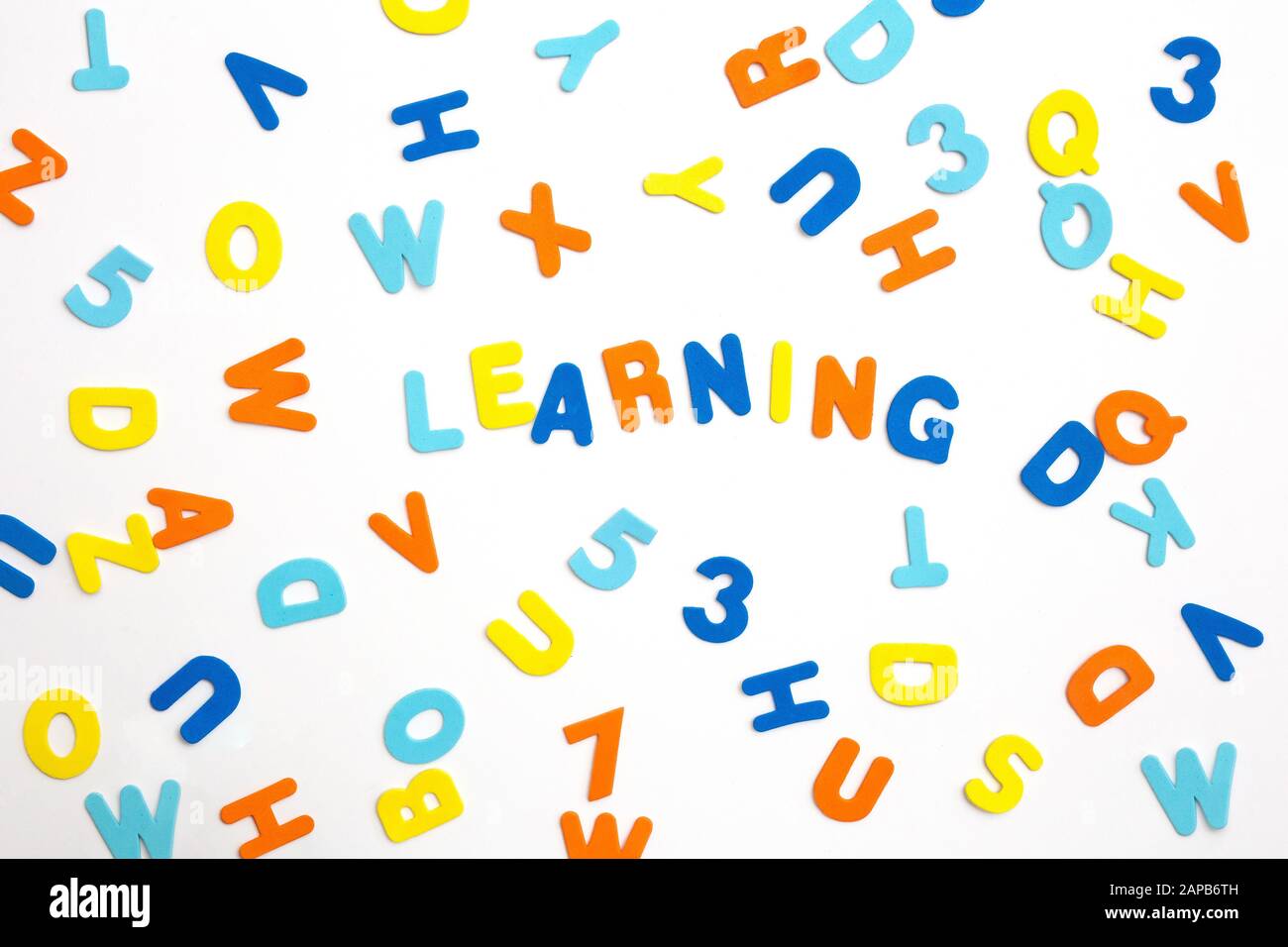 Colorful letters and the word learning on white background, learning or ...