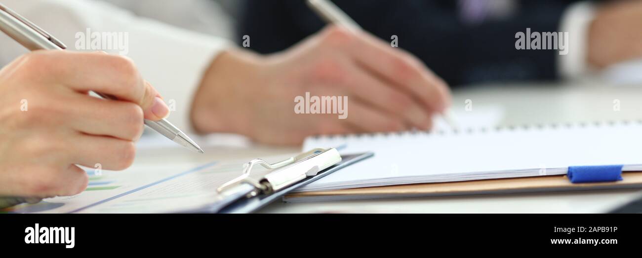 Directors signing important documents Stock Photo - Alamy