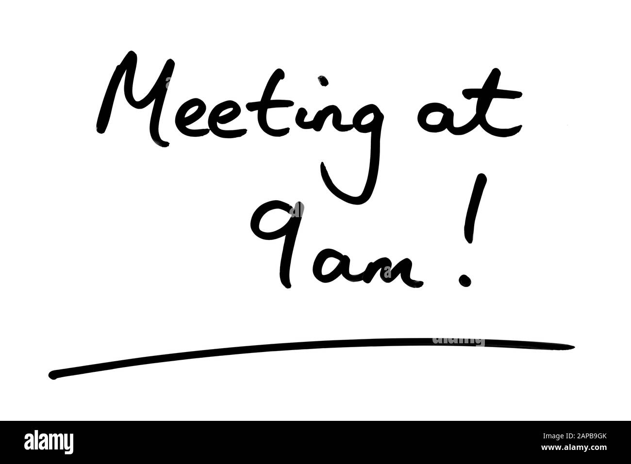 Meeting at 9am! handwritten on a white background Stock Photo - Alamy