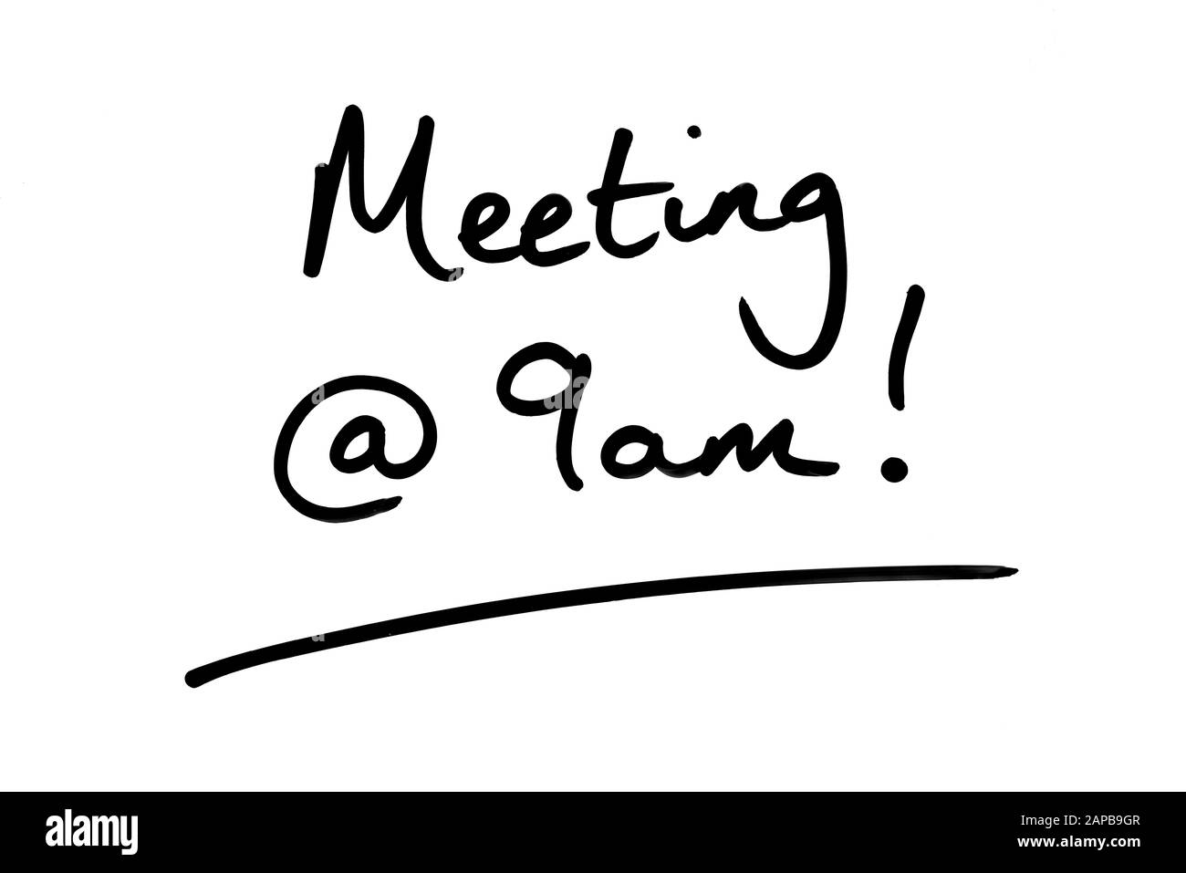 Meeting at 9am! handwritten on a white background Stock Photo - Alamy