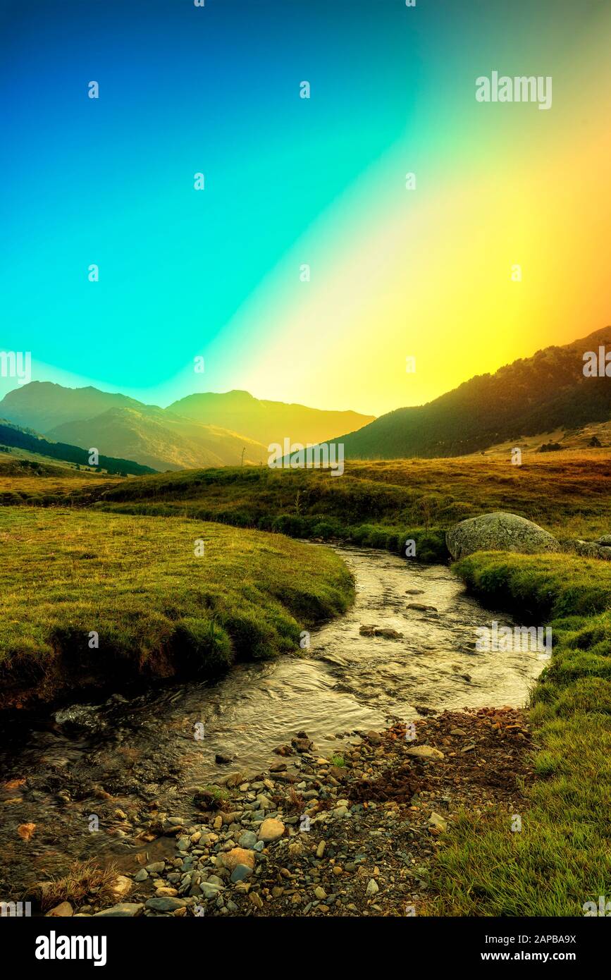 A sunrise with various colors in the Aran Valley Stock Photo - Alamy