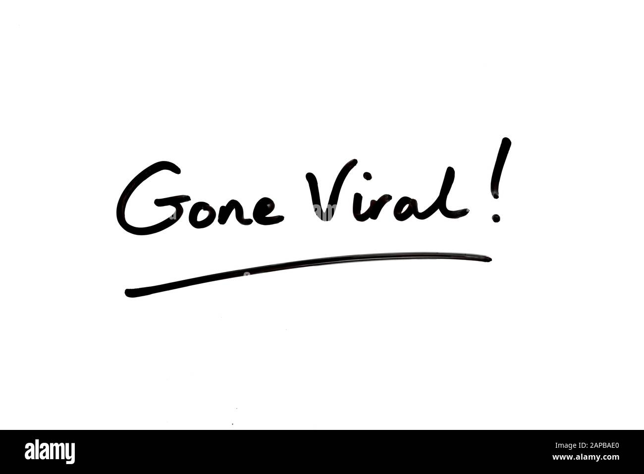 Close-up of the phrase Gone Viral! handwritten on a white background ...