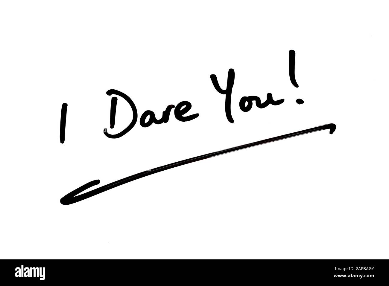 Close-up of I Dare You! handwritten on a white background Stock Photo ...