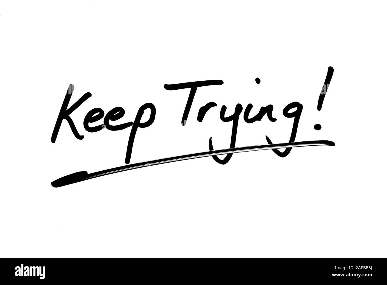 Close-up of a Keep Trying! message handwritten on a white background ...