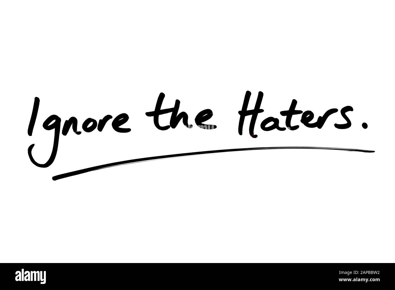 Ignore the Haters handwritten on a white background Stock Photo - Alamy