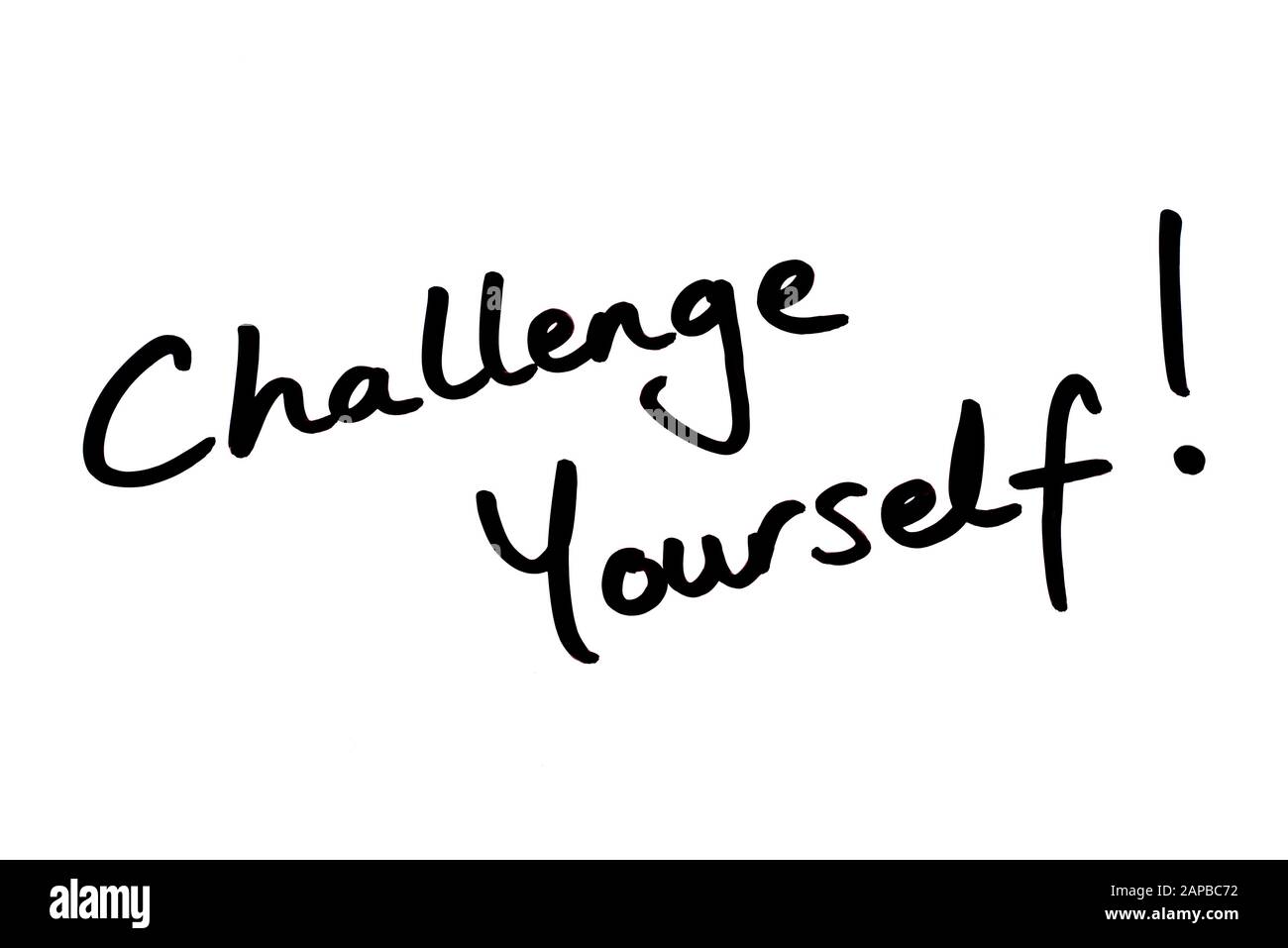 Challenge Yourself handwritten on a white background Stock Photo - Alamy