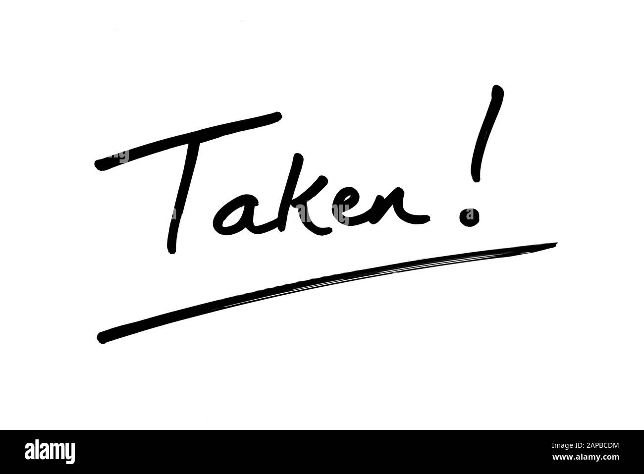 Taken! handwritten on a white background Stock Photo - Alamy