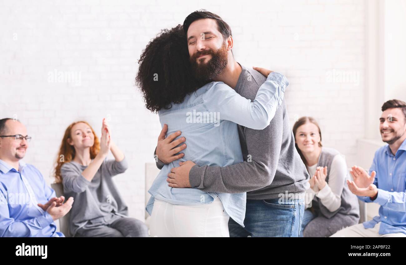 Happy Support Group Members Embracing Each Other After Successful ...