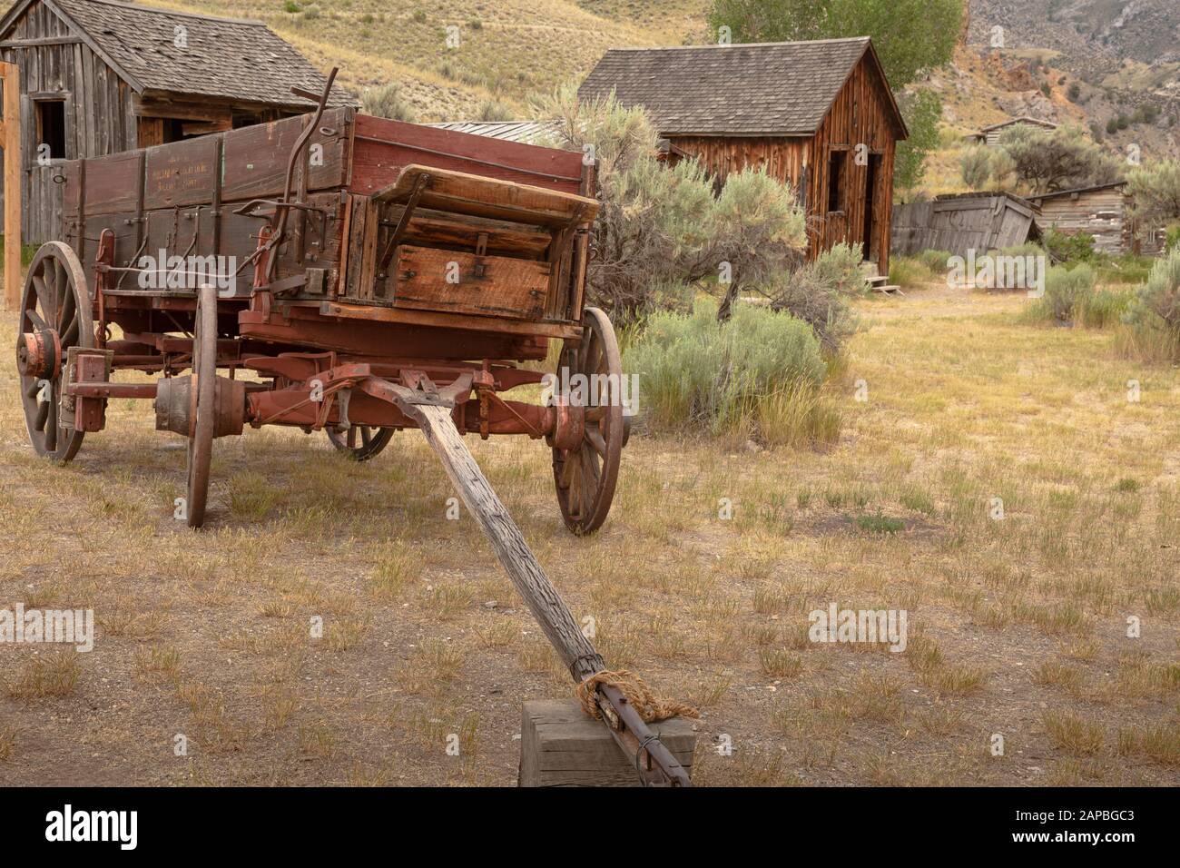 MT00426-00...MONTANA - Old farm wagon on display at Bannack, a ghost ...