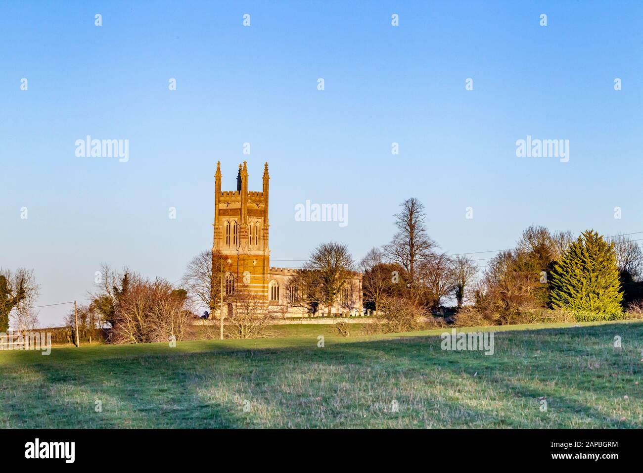 The church of St Mary the Virgin with the late afternoon sun giving the ...