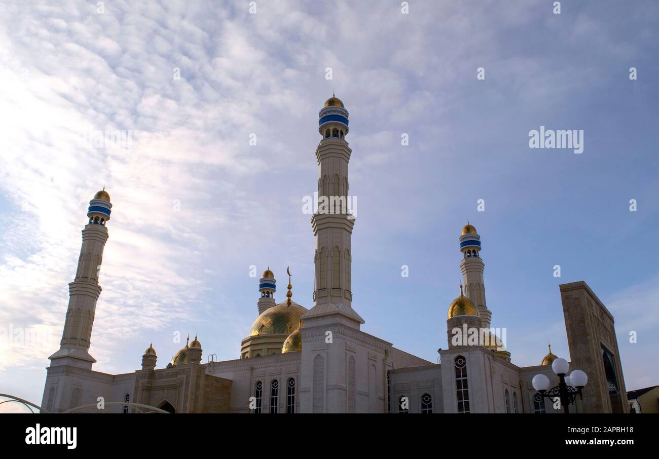 View of new beautiful mosque with golden domes Stock Photo - Alamy