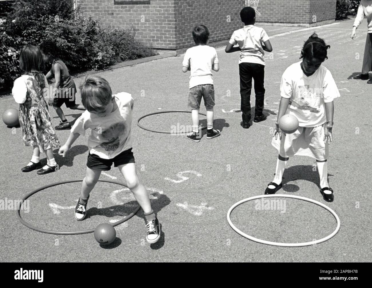 Schoolgirl playground england hi-res stock photography and images - Alamy