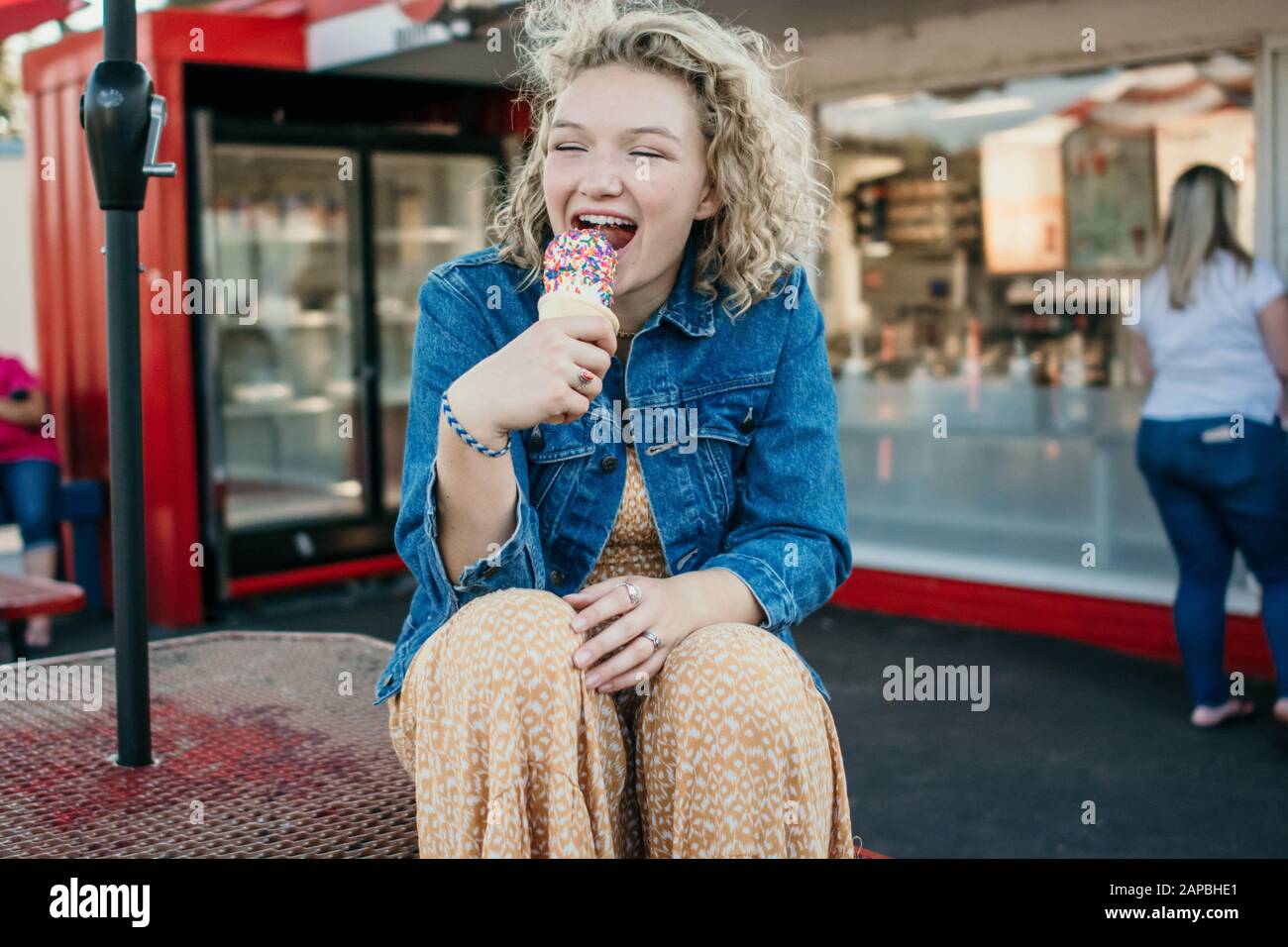 Girl at ice cream stand Stock Photo - Alamy