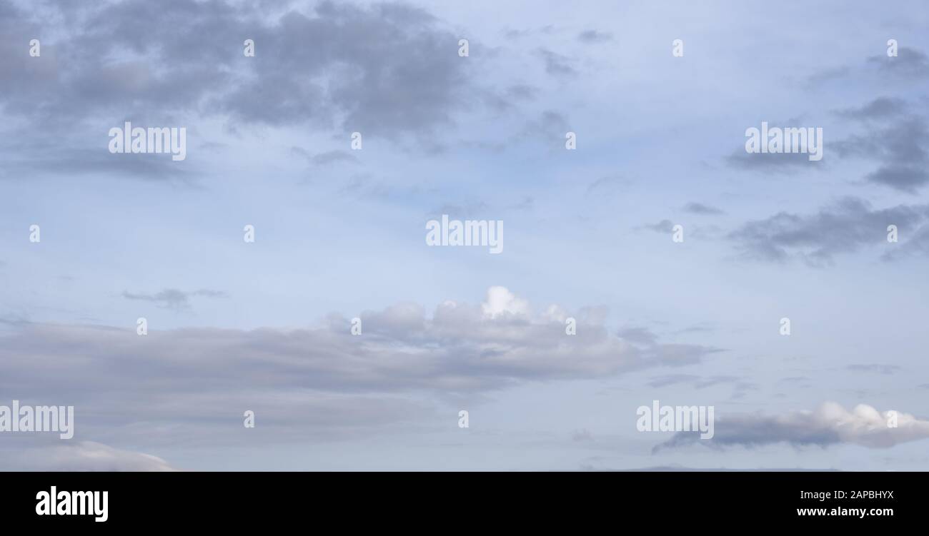 Clouds in the evening overcast sky view. Climate, environment and ...