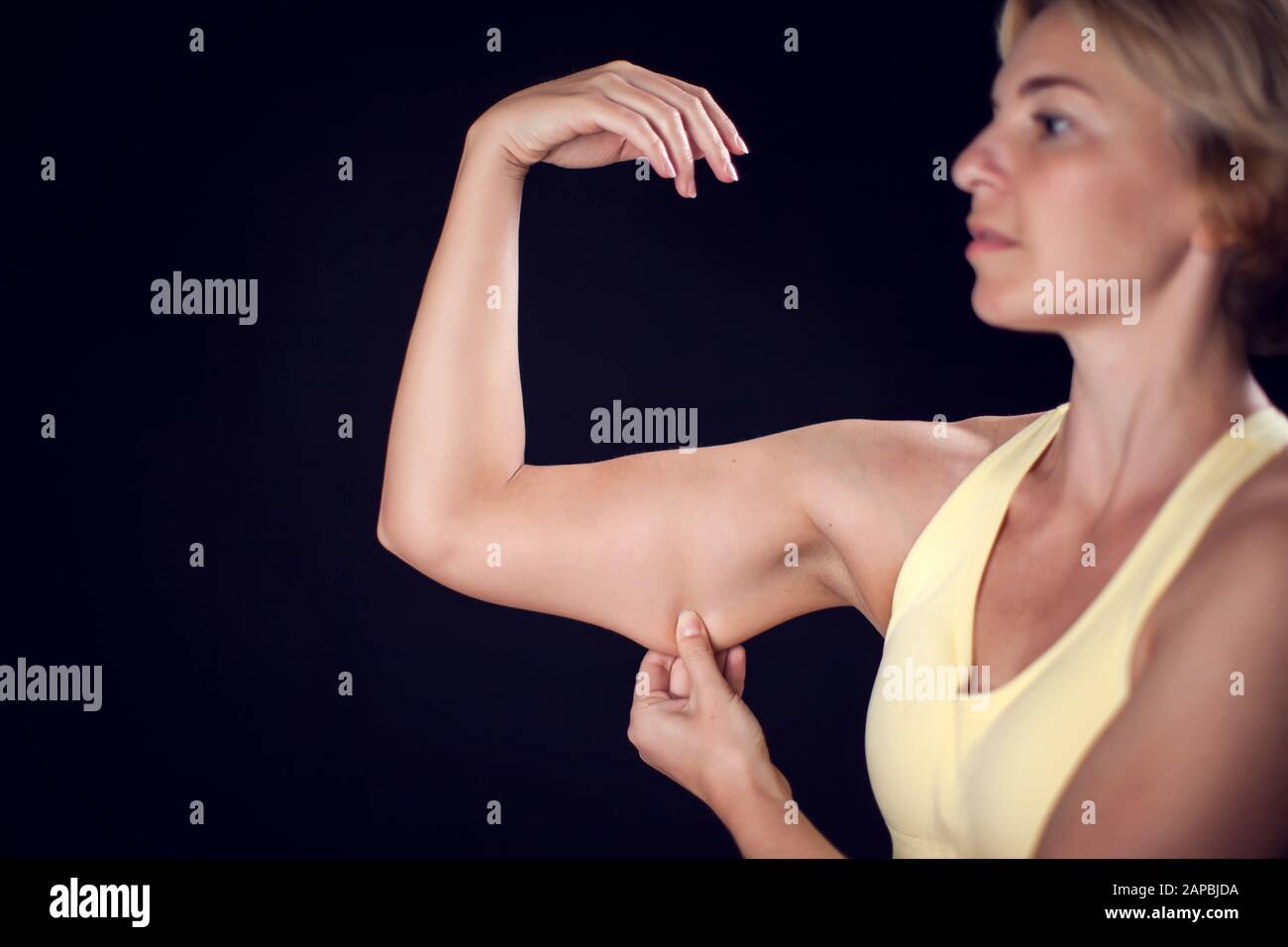 Female tricep muscle hi-res stock photography and images - Alamy