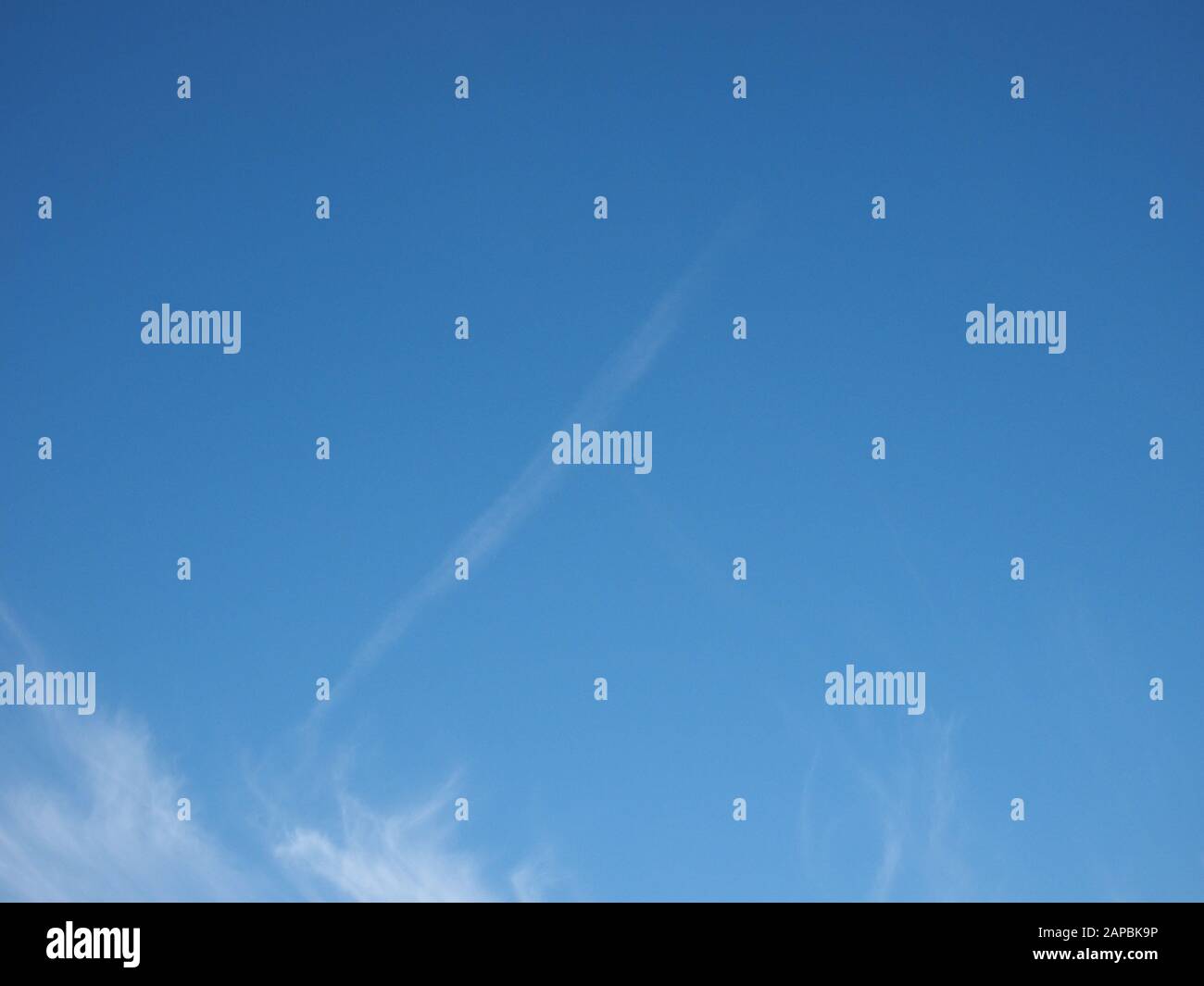 blue sky with clouds useful as a background Stock Photo - Alamy