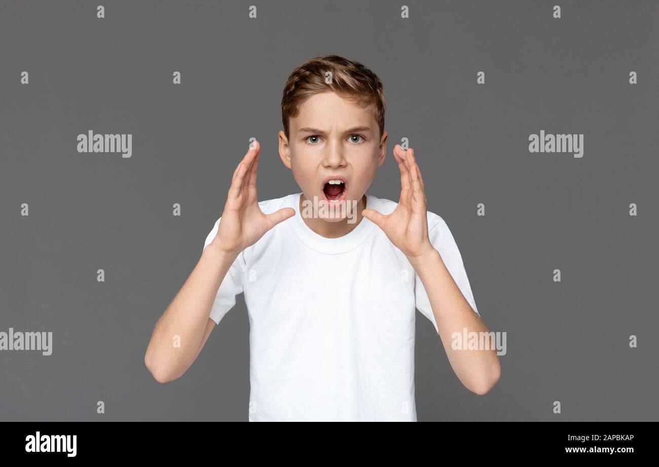 Emotional teenager shouting at camera about injustice Stock Photo - Alamy