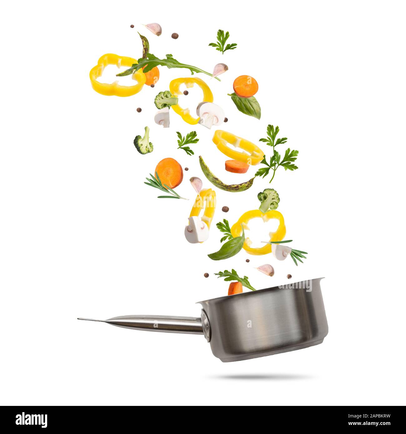 Healthy vegetarian eating and cooking with various flying chopped ...