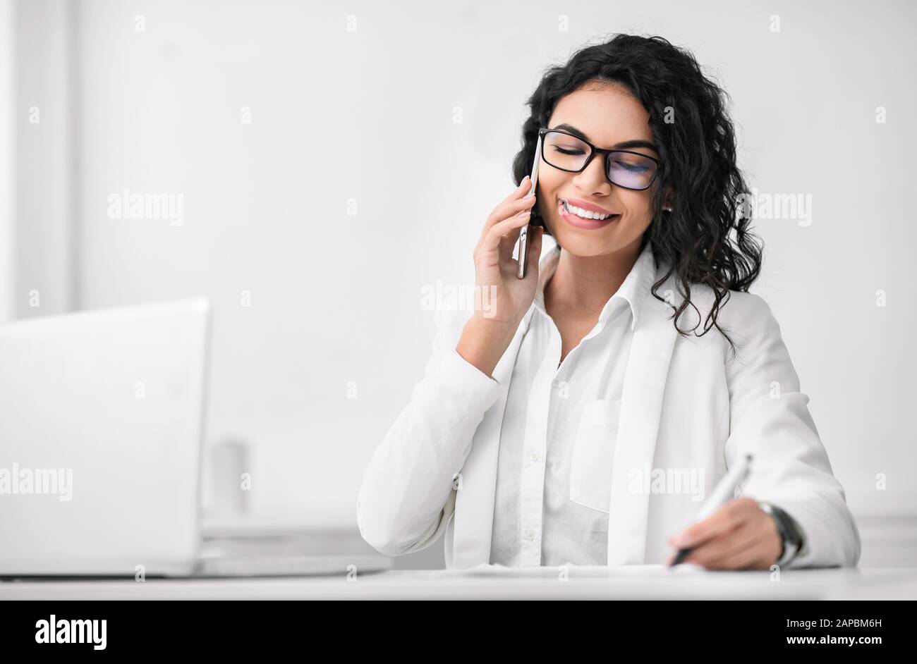 Phone call writing paperwork hi-res stock photography and images - Alamy