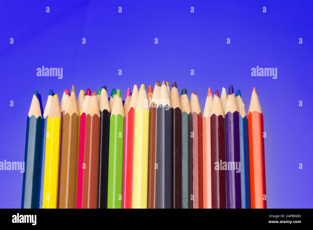 Colored pencils with a sharp point ready to draw and paint drawings ...