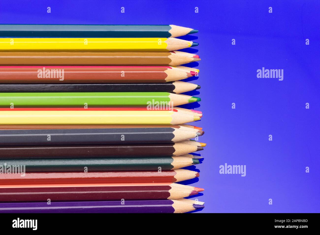 Colored pencils with a sharp point ready to draw and paint drawings ...