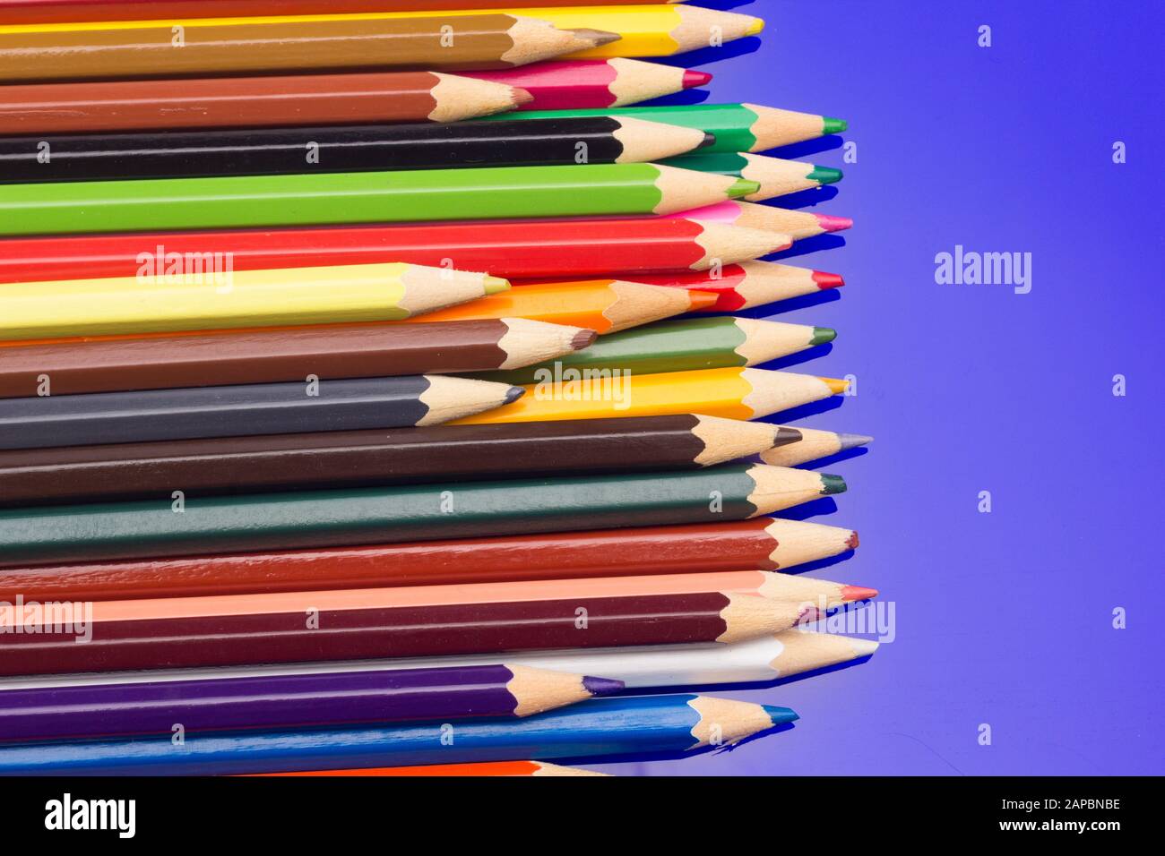 Colored pencils with a sharp point ready to draw and paint drawings ...