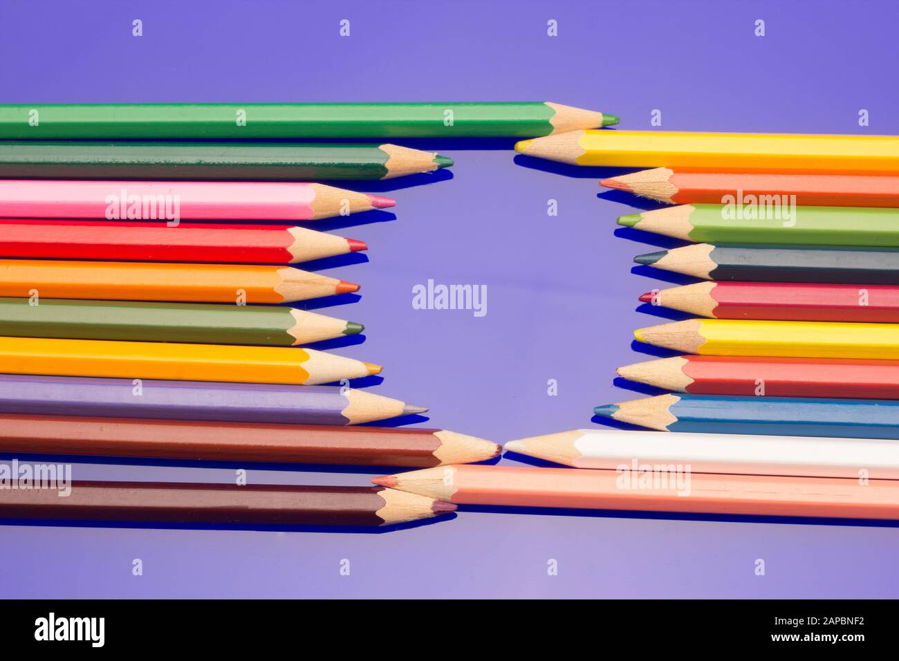 Colored pencils with a sharp point ready to draw and paint drawings ...