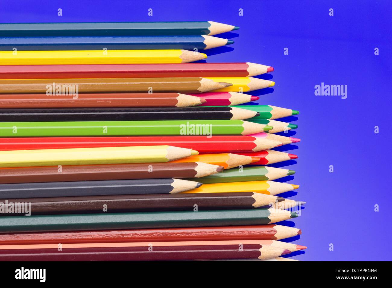 Colored pencils with a sharp point ready to draw and paint drawings ...