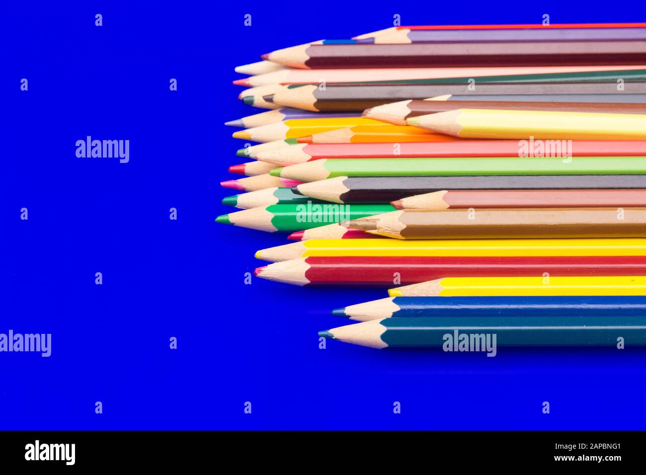 Colored pencils with a sharp point ready to draw and paint drawings ...