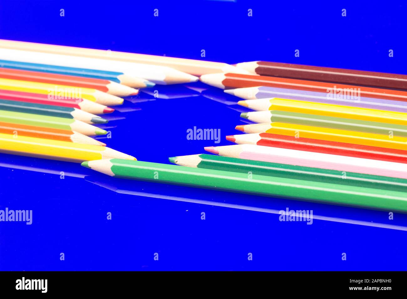 Colored pencils with a sharp point ready to draw and paint drawings ...