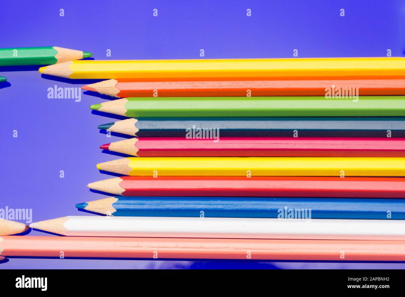 Colored pencils with a sharp point ready to draw and paint drawings ...