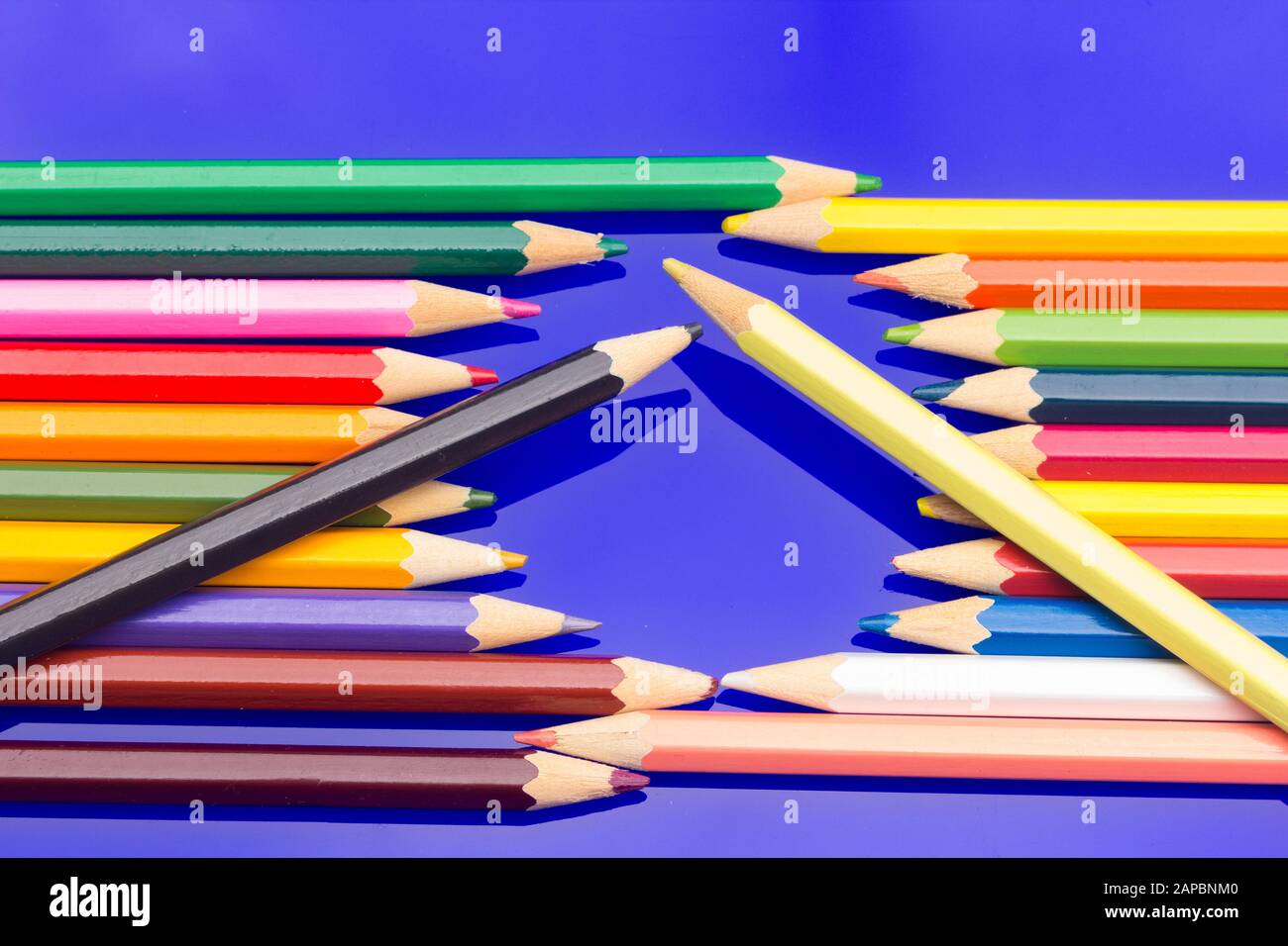 Colored pencils with a sharp point ready to draw and paint drawings ...