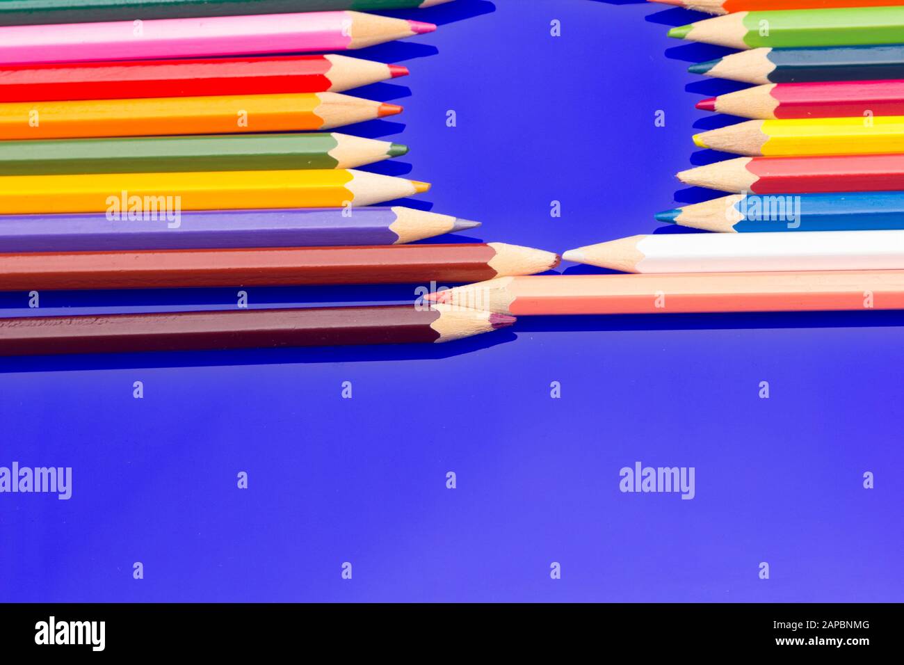 Colored pencils with a sharp point ready to draw and paint drawings ...