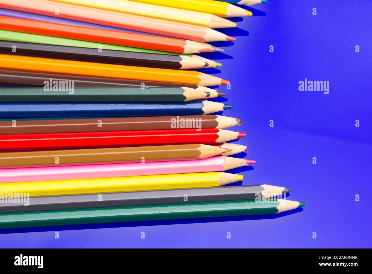 Colored pencils with a sharp point ready to draw and paint drawings ...