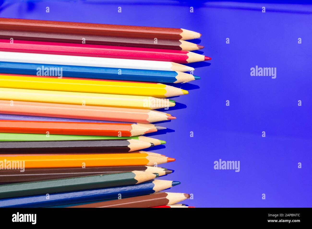 Colored pencils with a sharp point ready to draw and paint drawings ...