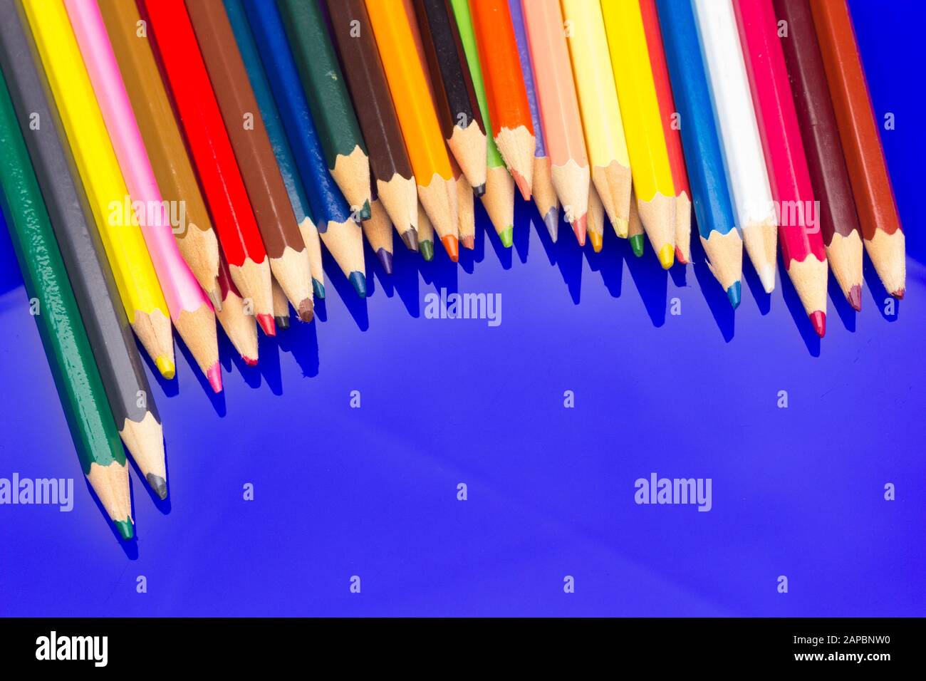 Colored pencils with a sharp point ready to draw and paint drawings ...