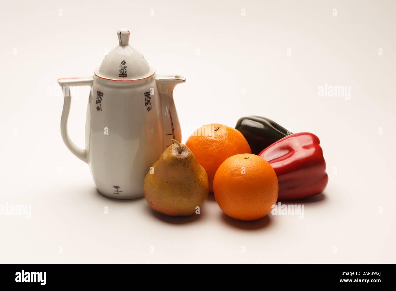 Vintage coffee maker with orange fruits, banana and red and green ...