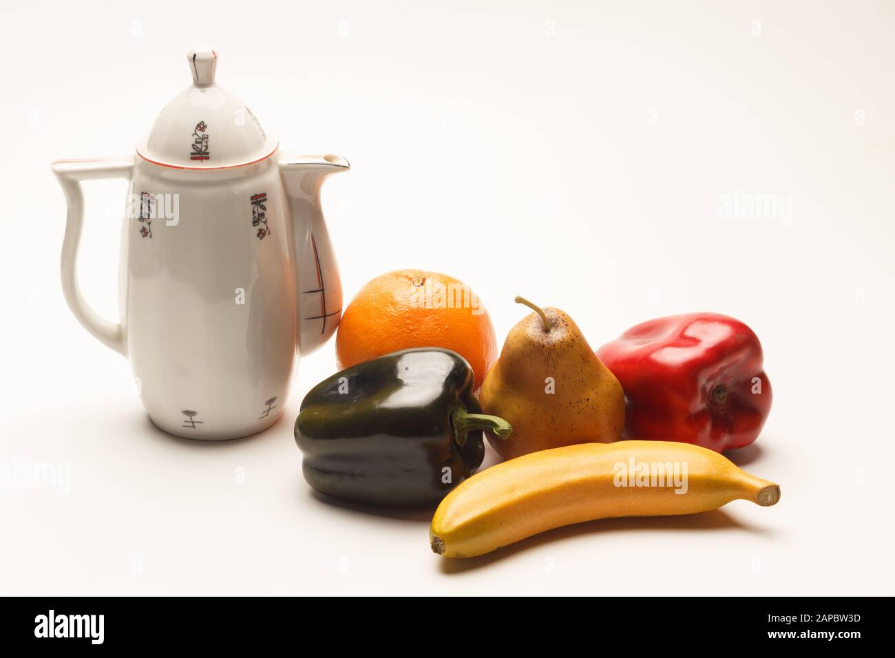 Vintage coffee maker with orange fruits, banana and red and green ...